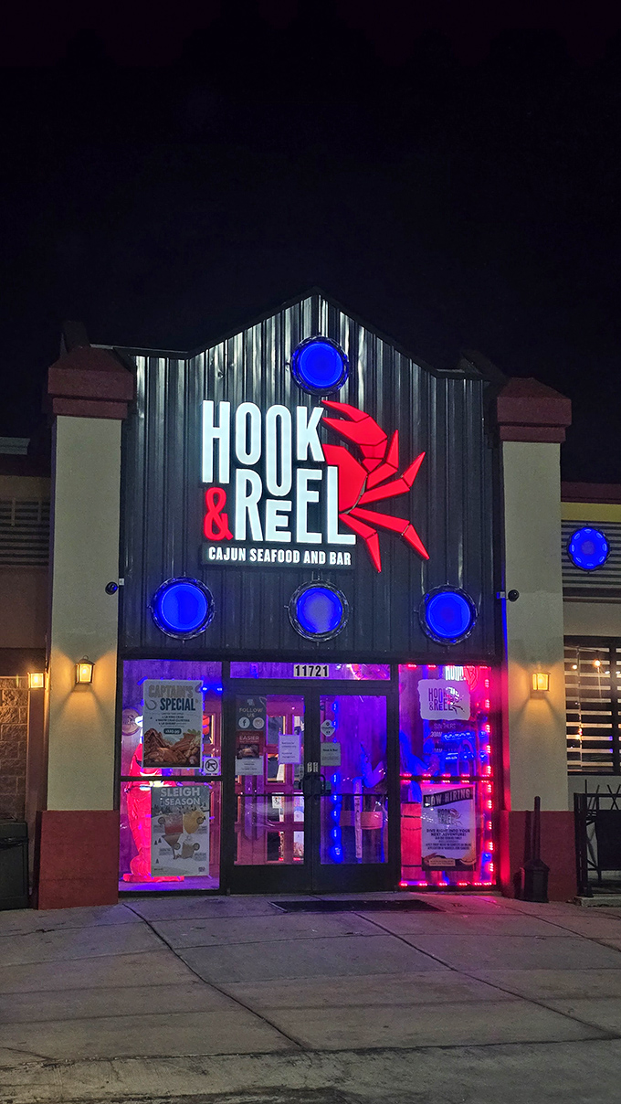 The nautical-themed exterior of Hook & Reel stands like a lighthouse for seafood lovers in landlocked Kansas, complete with those charming porthole windows.
