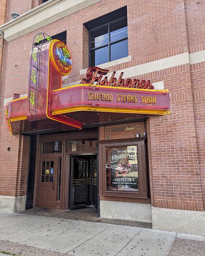 The neon marquee beckons like a lighthouse for hungry souls wandering Greektown. That retro sign isn't just advertising&mdash;it's making a delicious promise.