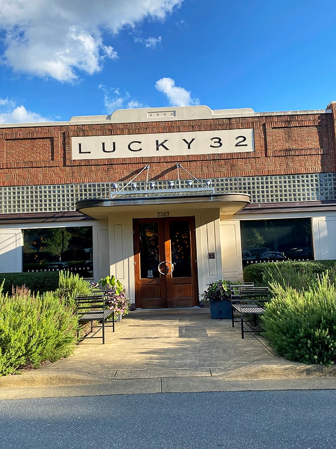 The brick facade of Lucky 32 stands like a Southern sentinel, promising culinary treasures within. No wonder folks make the pilgrimage from across the state.