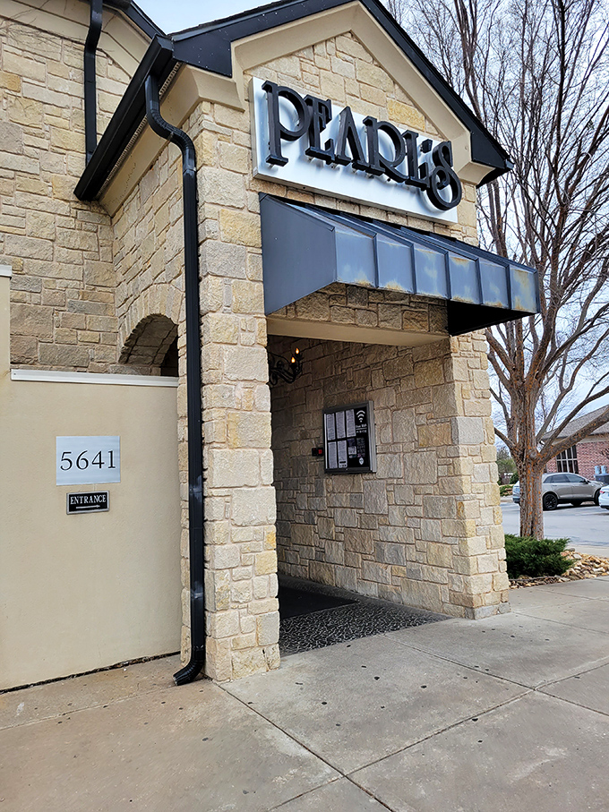 Pearl's striking stone exterior stands like a coastal mirage in Oklahoma City, complete with a rooftop patio that begs for sunset cocktails and seafood feasts.