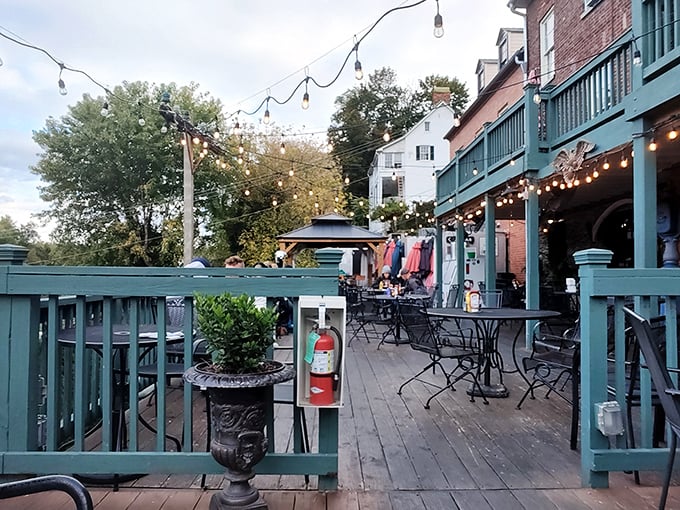The brick exterior of The Rabbit Hole beckons like a storybook invitation, complete with climbing roses and mountain views that make waiting for a table feel like a vacation.