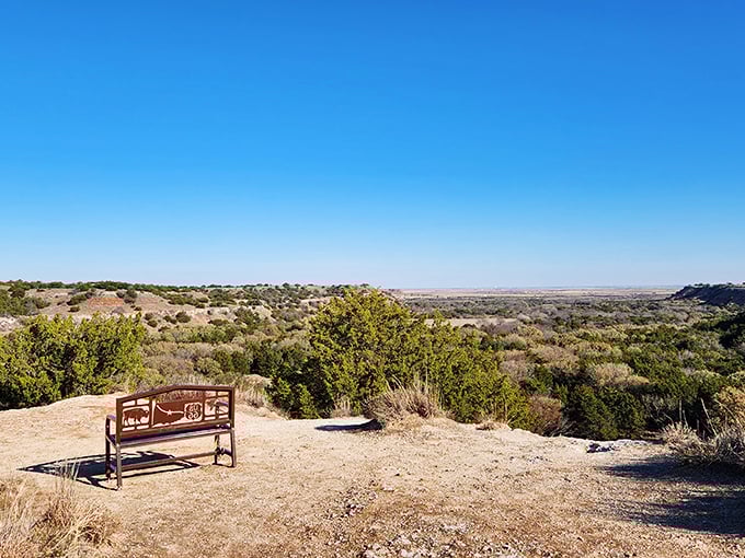 Mother Nature's masterpiece unfolds at Lake Watonga, where Oklahoma's blue skies reflect perfectly in waters that have quenched thirsts for centuries.