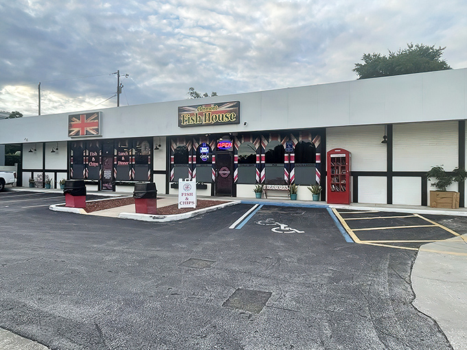 The Tudor-style exterior of Clermont Fish House stands as a slice of Britain in Florida, complete with an iconic red phone booth.