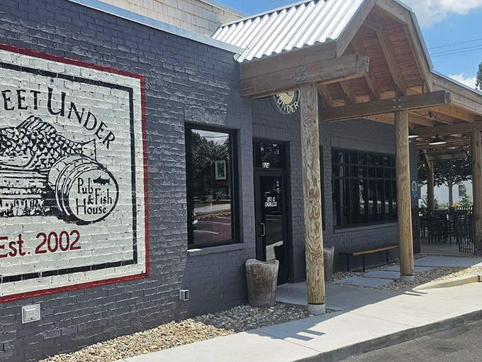 The unassuming gray exterior of Six Feet Under belies the seafood paradise waiting inside. That fish logo promises delicious things to come.
