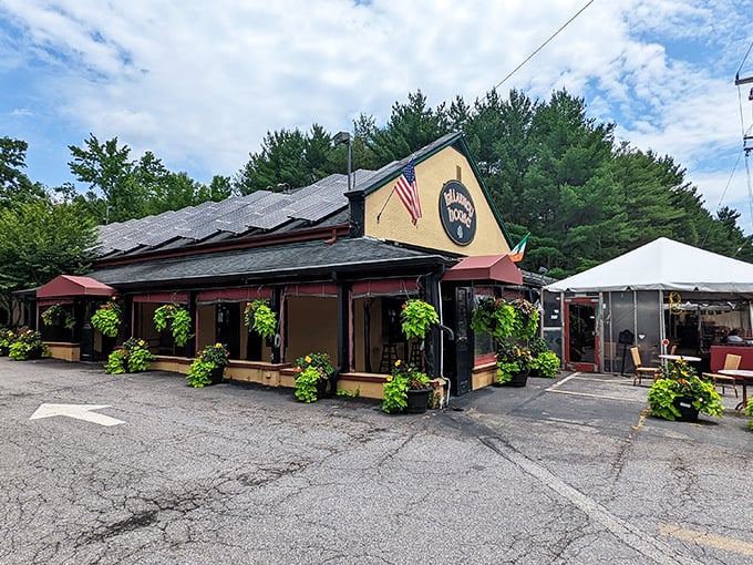 The unassuming yellow exterior of Killarney House hides culinary treasures within, like finding a pot of gold without chasing rainbows.