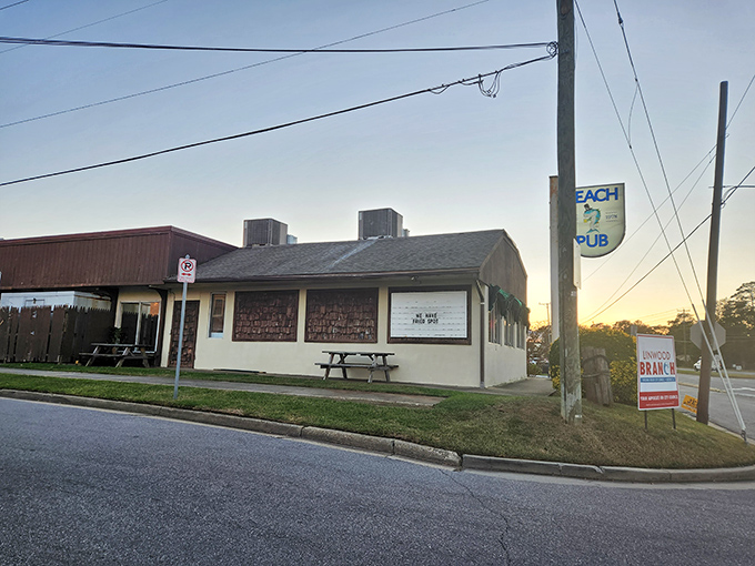 The unassuming exterior of Beach Pub stands as a testament to the old adage: never judge a seafood joint by its siding. Culinary treasures await inside.