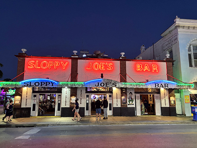The iconic red and white fa&ccedil;ade of Sloppy Joe's stands proudly on Duval Street, beckoning visitors like a lighthouse for the thirsty sailor.