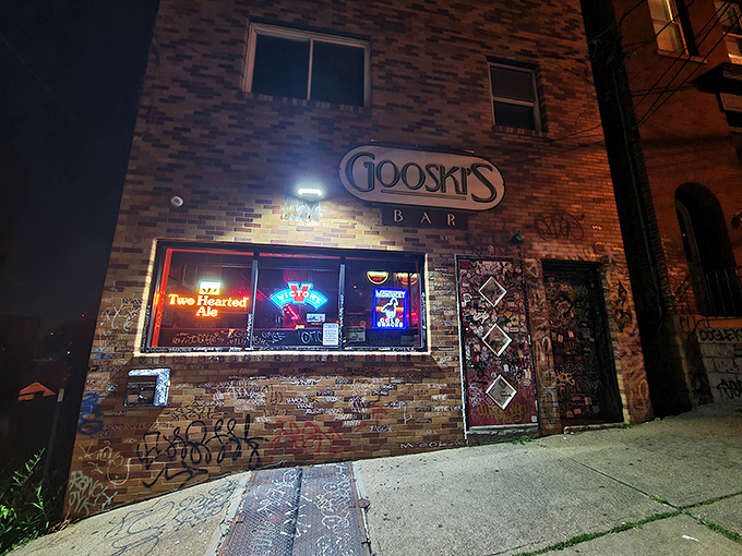 The iconic brick fa&ccedil;ade of Gooski's looks like the gatekeeper of Pittsburgh's underground music scene, complete with generations of sticker graffiti chronicling its storied history.