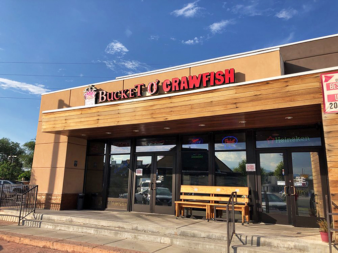 The unassuming exterior of Bucket O' Crawfish belies the seafood paradise within. Like finding Atlantis in a strip mall, but with better parking.