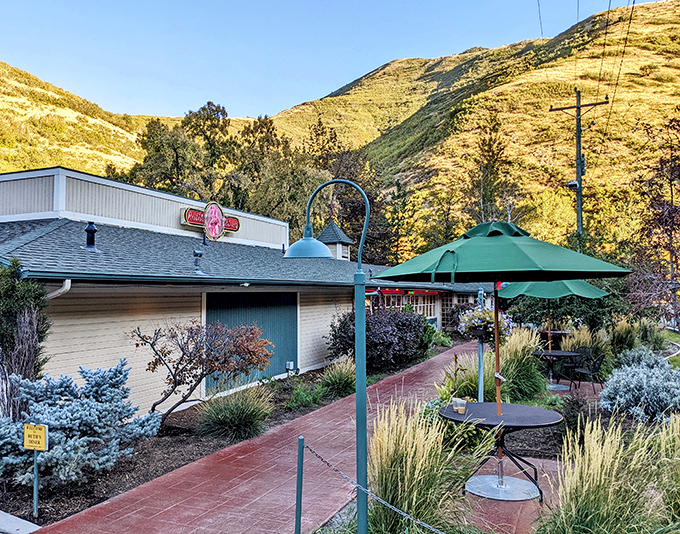 The red brick pathway to culinary paradise. Ruth's Diner nestles against Emigration Canyon's dramatic backdrop like a delicious secret waiting to be discovered.