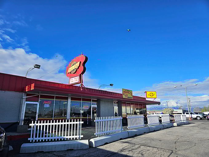 Ogie's bright yellow sign beckons hungry travelers like a breakfast lighthouse in West Valley City's sea of strip malls.