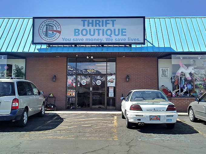 The iconic blue roof of The Other Side Thrift Boutique stands out like a beacon for treasure hunters across Salt Lake City.