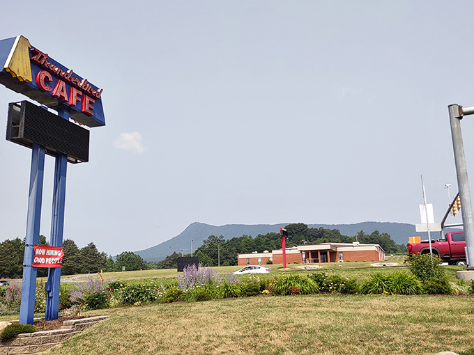 The unassuming exterior of Thunderbird Cafe stands like a beacon of breakfast hope, its neon sign promising delicious revelations within.