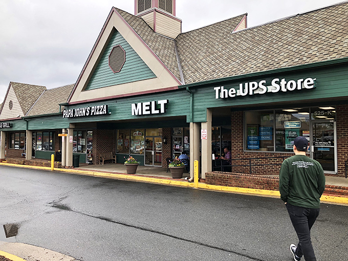 Hiding in plain sight between Papa John's and a UPS Store, this unassuming strip mall treasure proves that culinary greatness doesn't need fancy digs.
