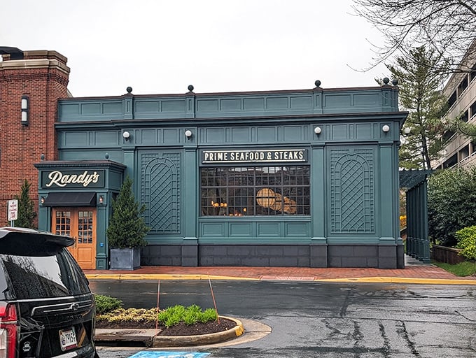 The emerald-green exterior of Randy's beckons like a culinary oasis, its warm wooden doors promising a retreat from the ordinary into the extraordinary.