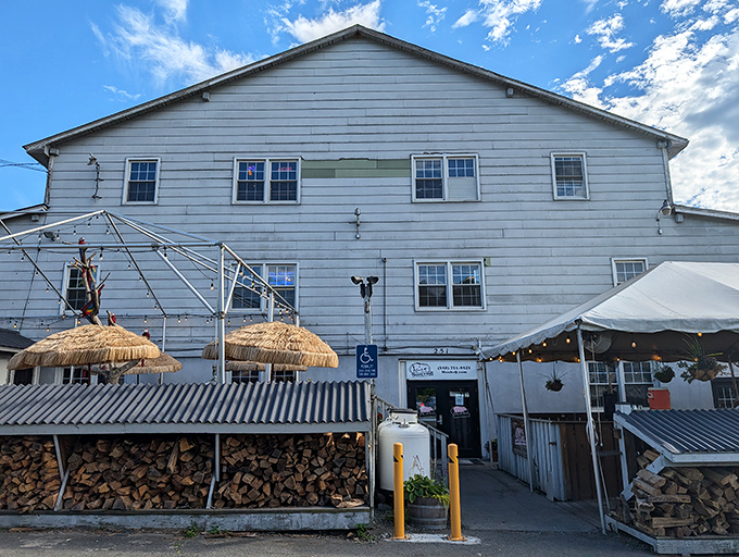 The white clapboard exterior of Monk's might seem unassuming, but those stacks of firewood tell you everything you need to know: smoke signals of deliciousness await inside.