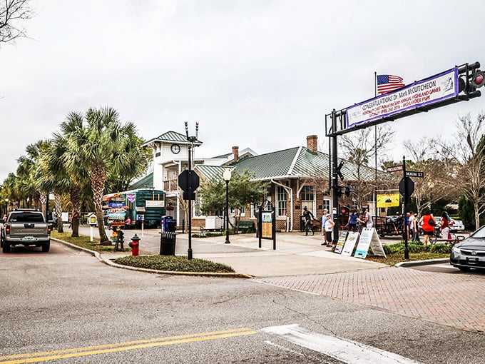 Dunedin's Main Street comes alive at twilight, where the iconic "Defending Freedom" arch welcomes visitors to a downtown that feels refreshingly un-Florida-like in all the best ways.