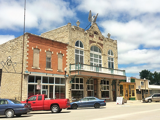 Historic limestone and brick buildings line Wamego's charming main street, where small-town America meets Emerald City dreams.