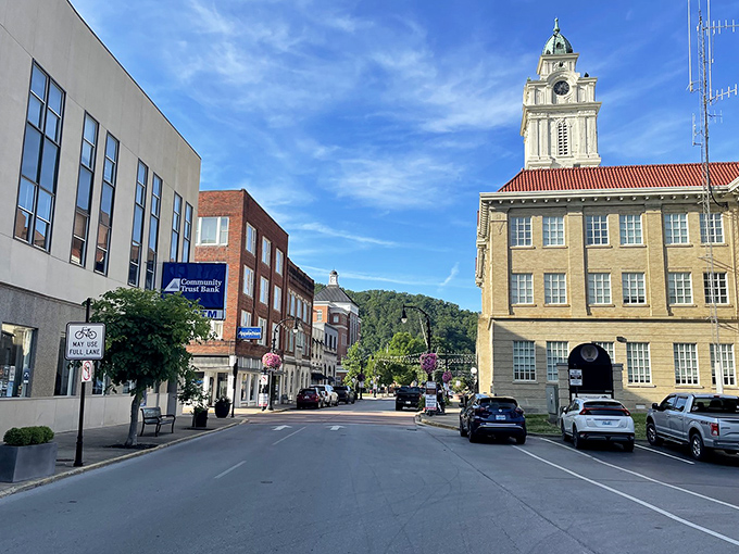 Downtown Pikeville greets you with that perfect small-town charm where the historic courthouse stands proudly against a backdrop of Appalachian mountains and blue skies.