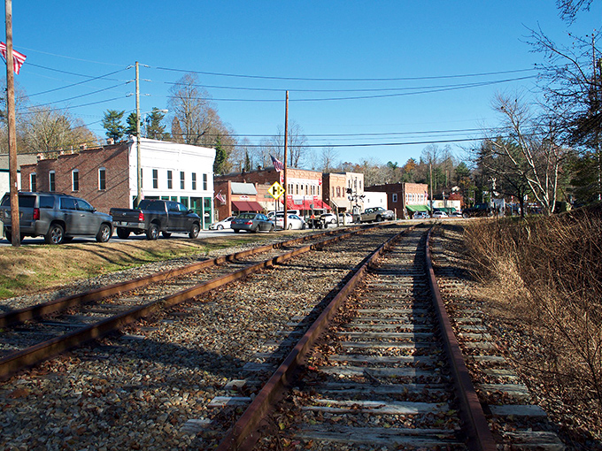 Main Street Saluda welcomes you with historic brick buildings, a vintage military cannon, and that small-town charm that makes you want to cancel your return flight.