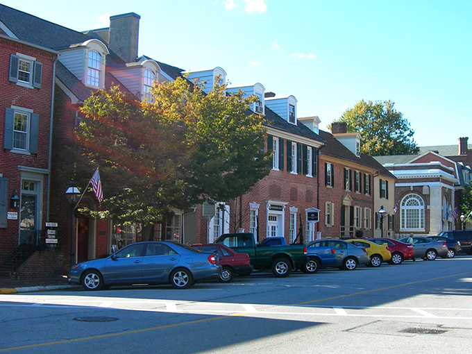 The historic district's red-brick buildings stand like a colonial time capsule, where America's founding story unfolds with every cobblestone step.