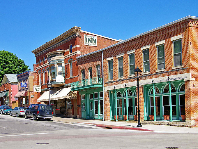 Main Street's parade of Victorian storefronts feels like you've stumbled onto a movie set where modern commerce meets 19th-century architecture.