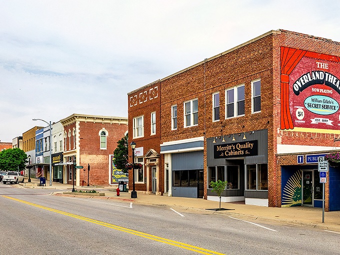 Downtown Nebraska City feels like stepping into a Norman Rockwell painting where brick buildings tell stories and Sloan Drug might still serve phosphates at the counter.