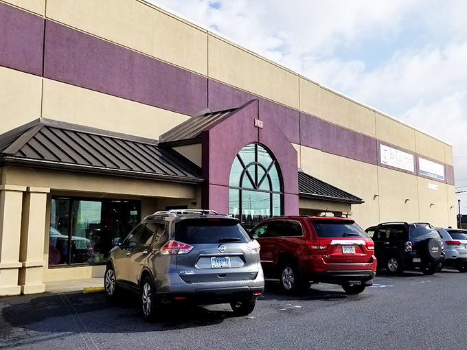 The distinctive purple and beige exterior welcomes treasure hunters with its arched window&mdash;like a portal to another shopping dimension. 