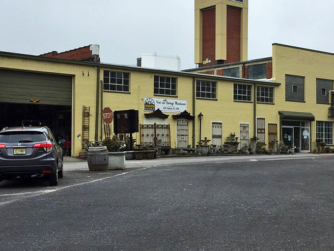 The sunshine-yellow exterior of Black Dog Salvage stands like a beacon for treasure hunters. This architectural playground in Roanoke promises adventures in every corner.