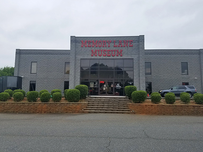 The unassuming exterior of Memory Lane Museum holds treasures that would make any car enthusiast's heart race like a souped-up V8. 