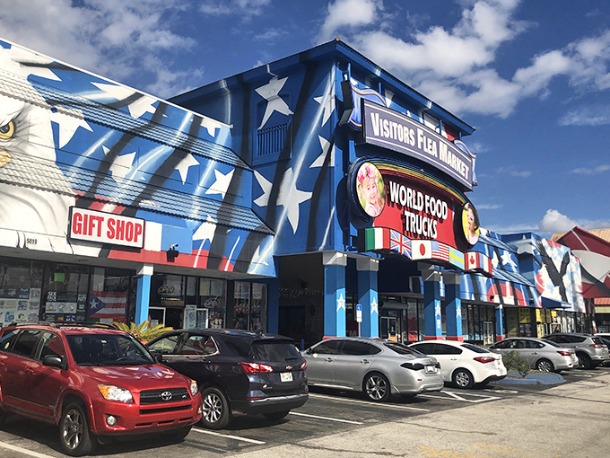 The blue-starred facade of Visitors Flea Market stands like a retail United Nations, complete with international flags welcoming bargain hunters from around the globe.