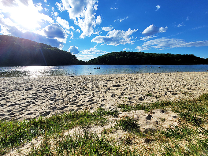 The path less traveled rewards you with this view &ndash; Greenbrier's shimmering lake reflecting the sky like nature's own infinity pool.