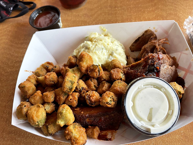 Fried okra, meat, and sides that would make your grandmother nod in approval. This is the plate that silences conversation except for appreciative mumbles.