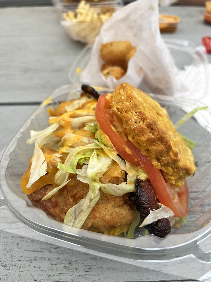 Fresh lettuce and tomato bring bright notes to this chicken classic, proving simplicity often delivers the most satisfying melody.