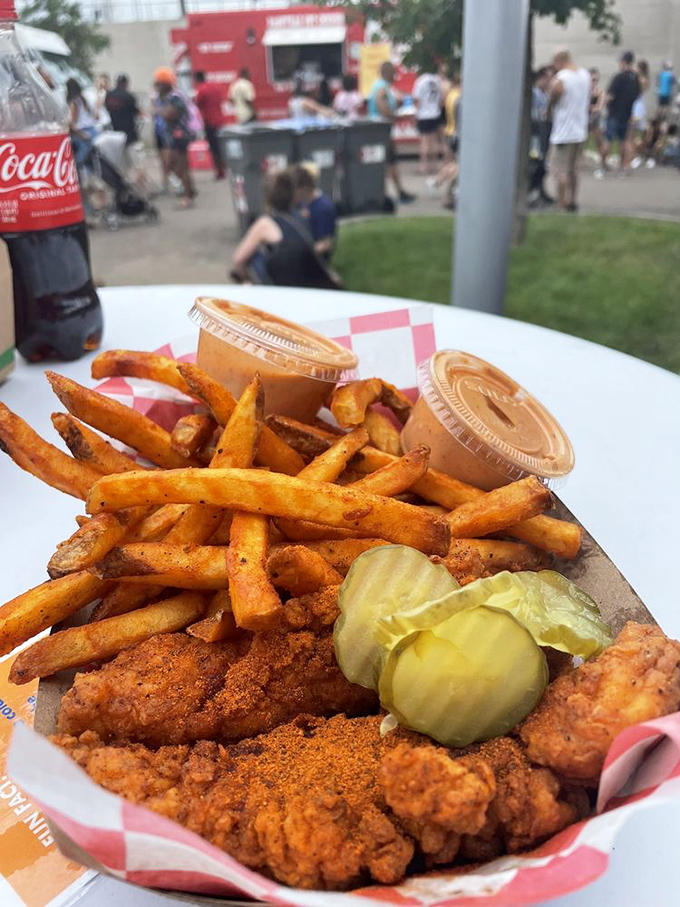 Festival food elevated to an art form. This plate says, "I might be served on a checkered paper, but I deserve fine china."