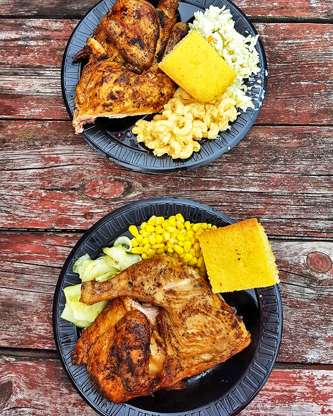 Smoked chicken that proves poultry deserves respect in BBQ land. That golden cornbread square is basically edible sunshine.