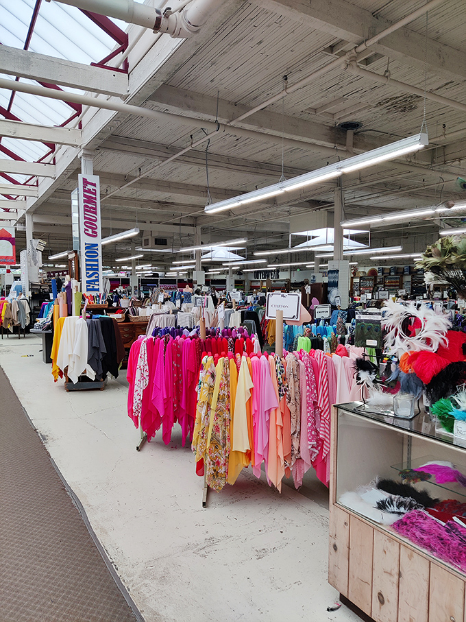 Fashion fabrics arranged by color create a textile rainbow that makes even the grayest Oregon day feel like a Technicolor dream.