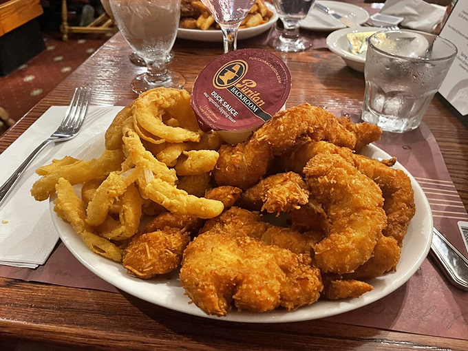 Coconut chicken tenders that would make a tropical vacation jealous. Paradise found between Manchester and your taste buds.