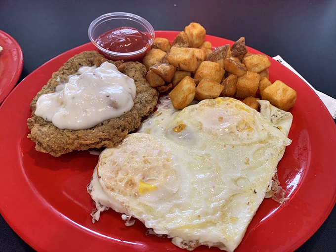 Country fried steak with gravy so good you'll want to write home about it. Those potatoes are the unsung heroes of this plate.