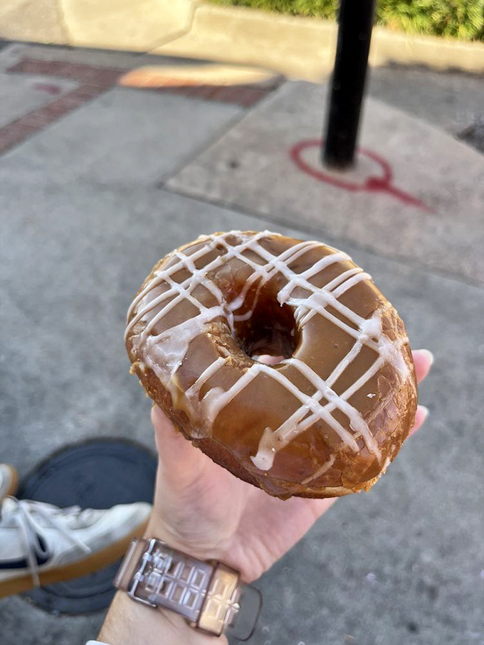 The drizzle of white glaze creates an abstract expressionist pattern Jackson Pollock would envy—if only his paintings tasted this delicious.