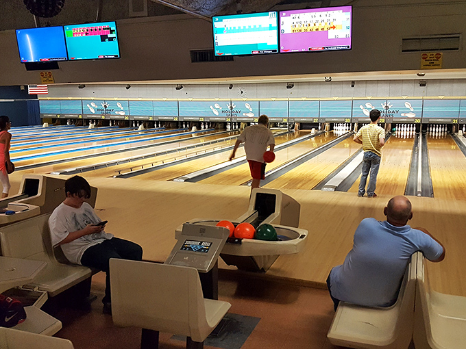 League night brings out Oklahoma City's serious bowlers, their focused approaches and fluid releases transforming this humble alley into an arena of athletic precision.