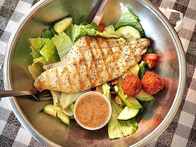 Protein meets garden in perfect harmony. This grilled catfish salad proves healthy eating doesn't require sacrificing an ounce of flavor.