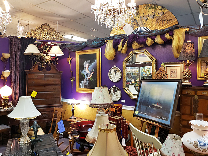 That sunshine-yellow chair demands attention amid carefully curated treasures. A mid-century modern island in a sea of collectibles.