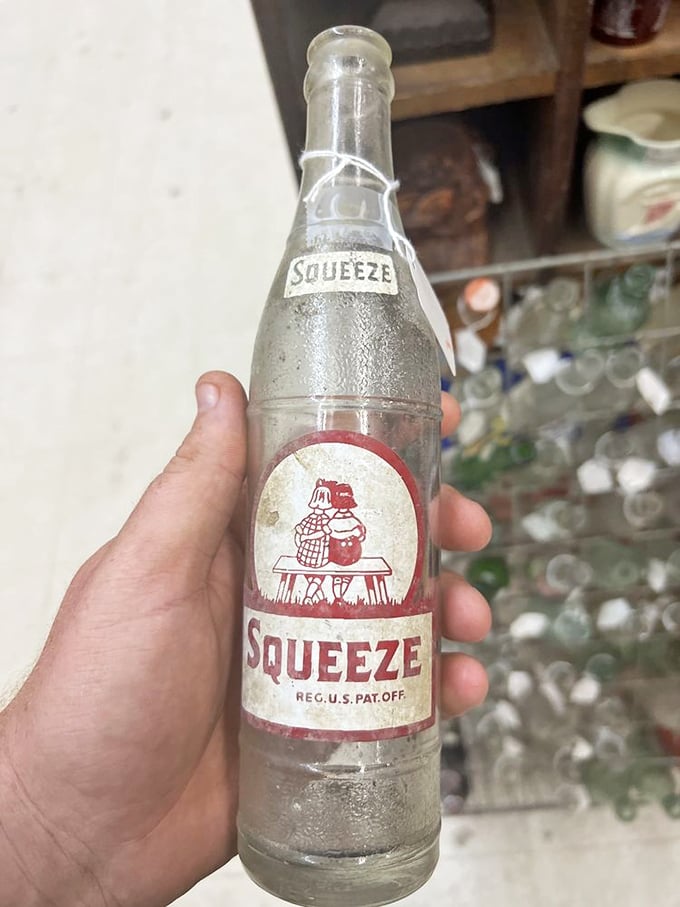 An old Squeeze soda bottle that whispers tales of summer days long past. Artifacts like these aren't just collectibles; they're liquid history in glass form.
