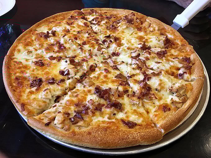 Pizza that makes a compelling argument for your attention in a cheesesteak joint. The crispy edge and melty cheese coverage ratio is scientifically perfect.