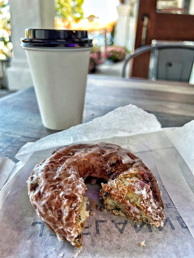 Holding edible art &ndash; that raspberry glaze shines brighter than most Hollywood careers. Worth every sticky finger.