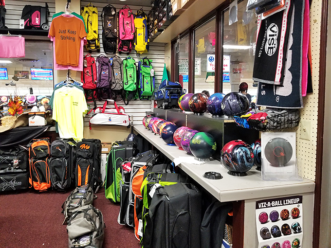 The pro shop wall&mdash;a rainbow of possibilities where the right ball promises to transform your awkward gutter balls into majestic strikes.