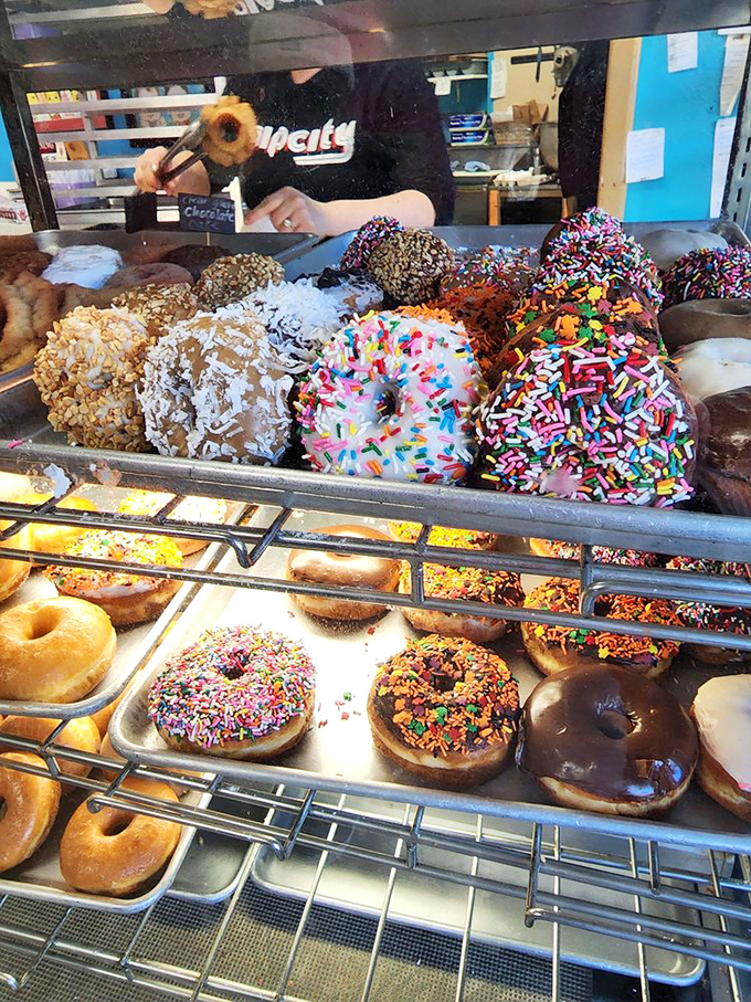 Sprinkles so vibrant they make Willy Wonka seem understated. These aren't just toppings &ndash; they're tiny celebrations on circular stages.