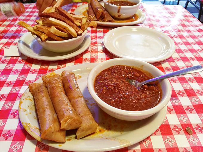 These tamales with that rich sauce are the unsung heroes of Doe's menu&mdash;like finding an amazing B-side on your favorite album.
