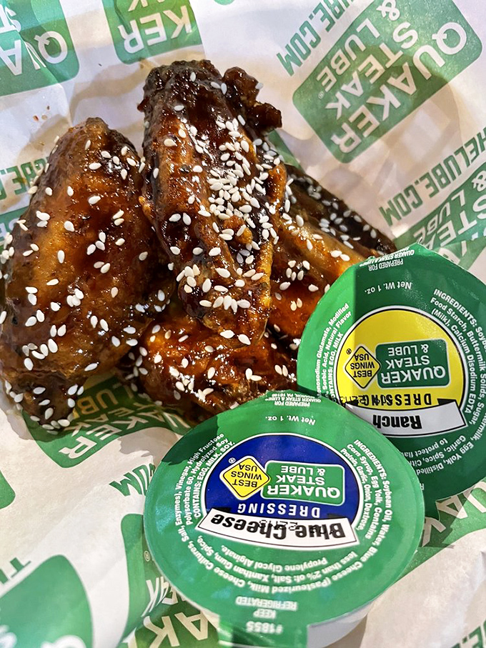 A table spread that says "bring friends or prepare for leftovers"&mdash;ribs, steaks, and sides arranged like a family portrait of American comfort food classics.